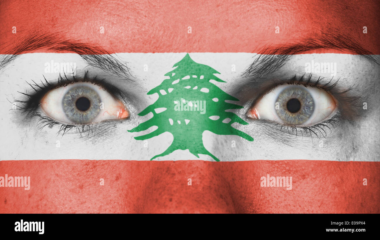 Close up of eyes. Painted face with flag of Lebanon Stock Photo - Alamy