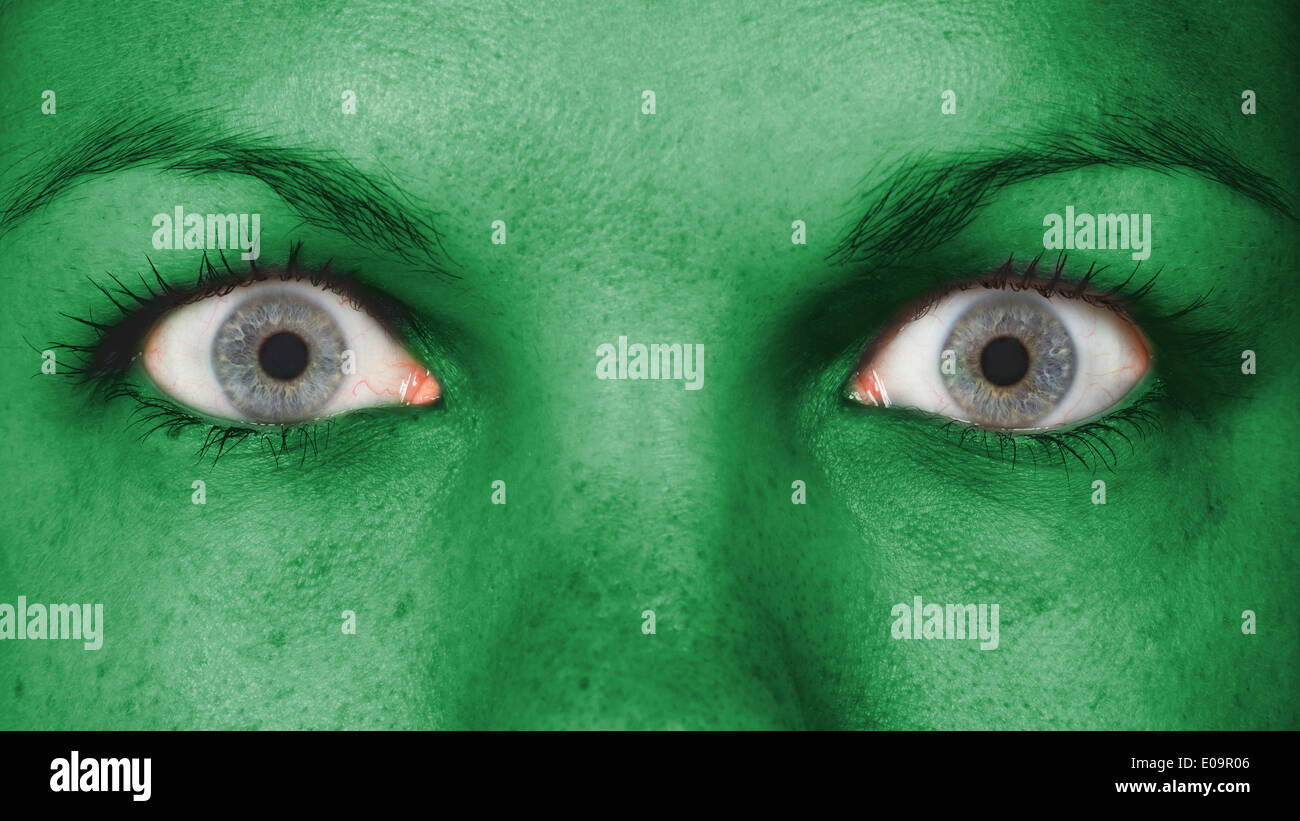 Close up of eyes. Painted face with flag of Libya Stock Photo - Alamy