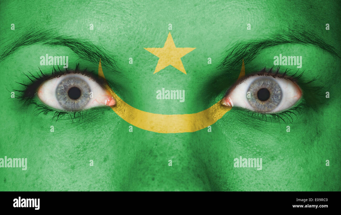 Close up of eyes. Painted face with flag of Mauritania Stock Photo - Alamy