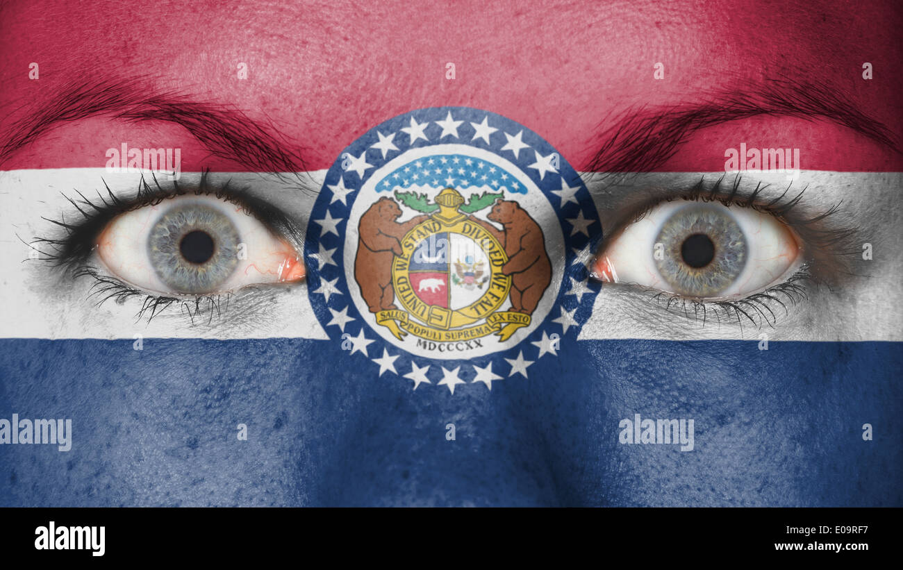Close up of eyes. Painted face with flag of Missouri Stock Photo - Alamy