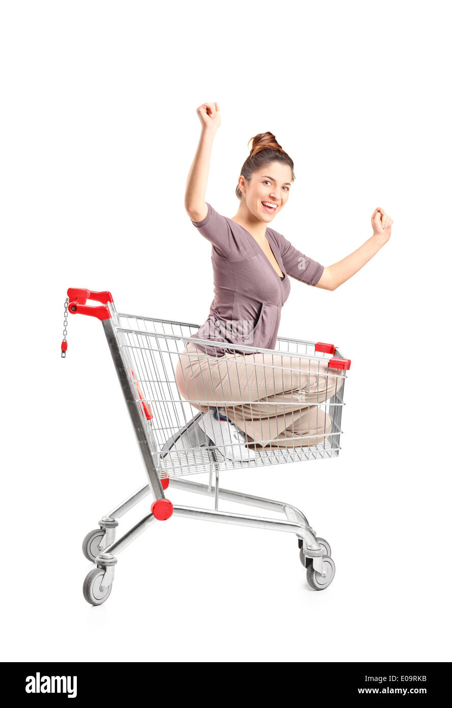 Woman riding in a shopping cart Stock Photo - Alamy