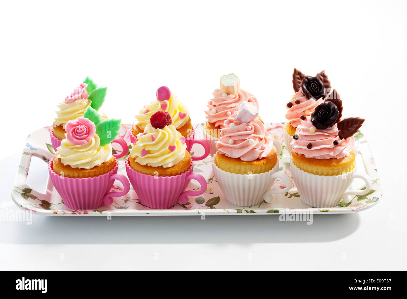 Tray of eight cupcakes on white ground Stock Photo - Alamy