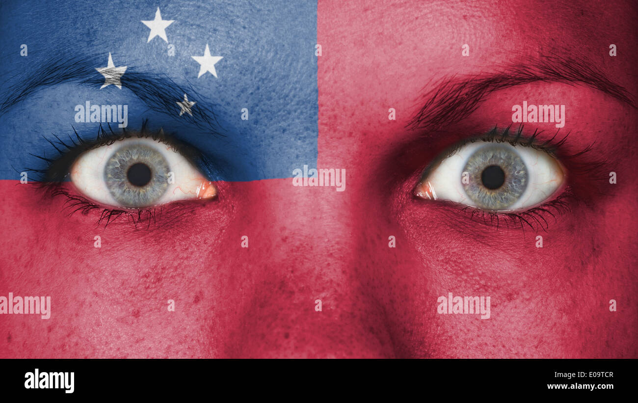 Close up of eyes. Painted face with flag of Samoa Stock Photo - Alamy