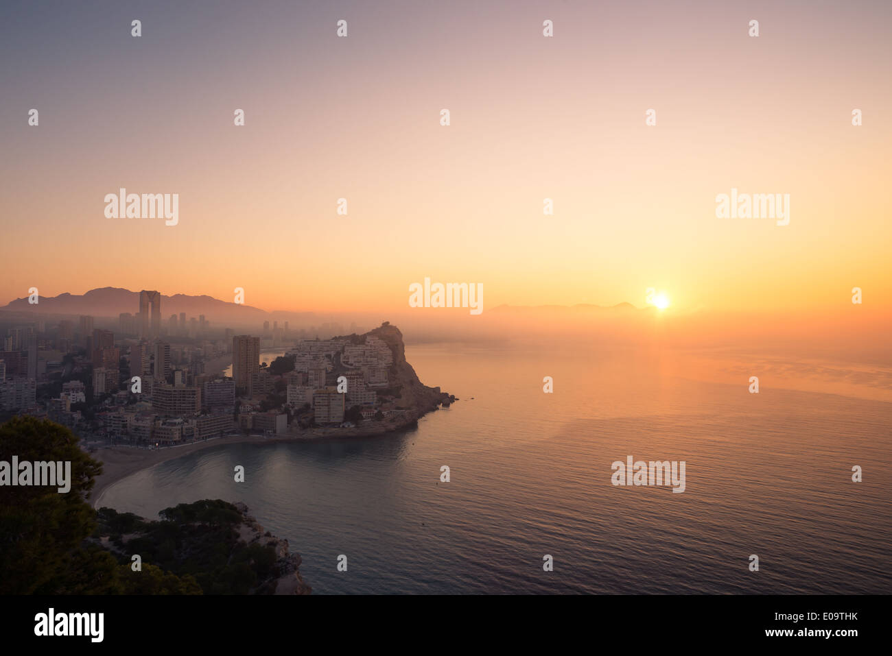 A foggy sunrise on Benidorm landmark skyline, Costa Blanca, Spain Stock ...