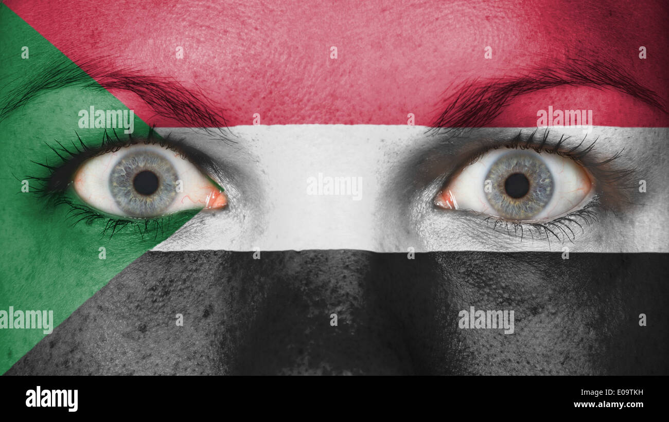 Close up of eyes. Painted face with flag of Sudan Stock Photo - Alamy