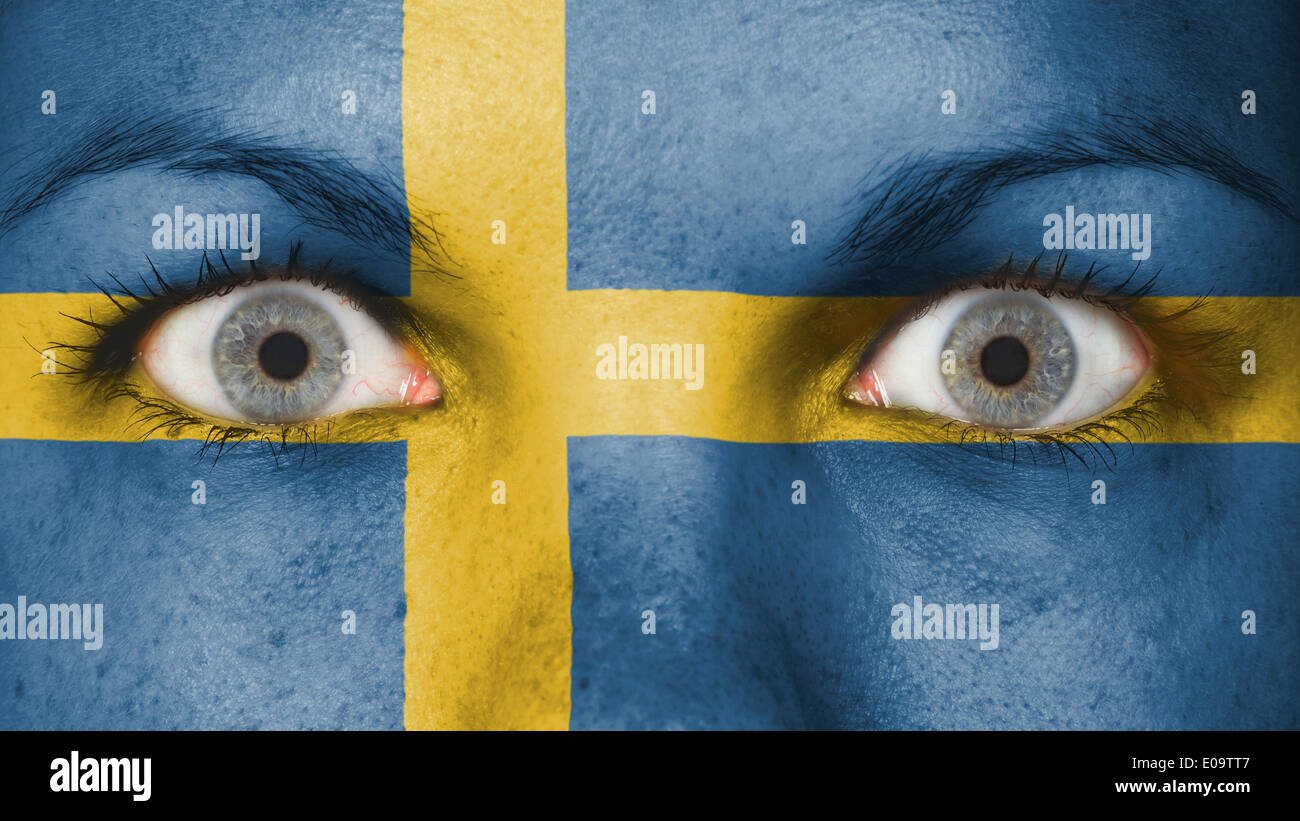 Swedish flag painted face hi-res stock photography and images - Alamy