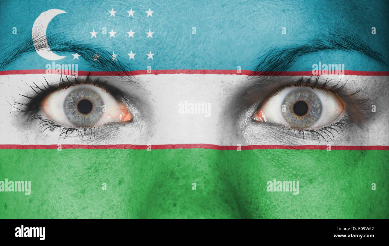 Close up of eyes. Painted face with flag of Uzbekistan Stock Photo - Alamy