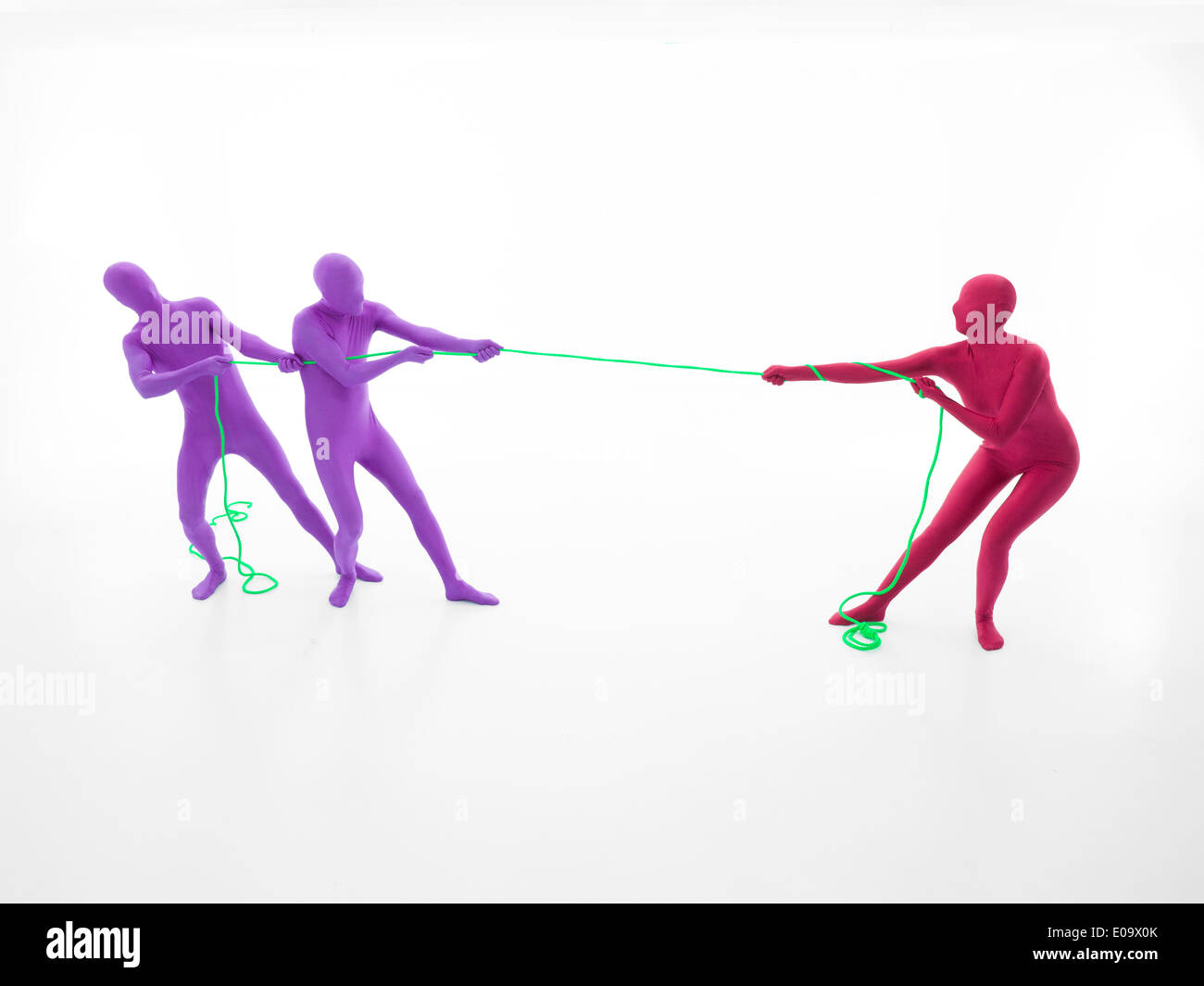 faceless strangers pull a green rope on white background Stock Photo ...