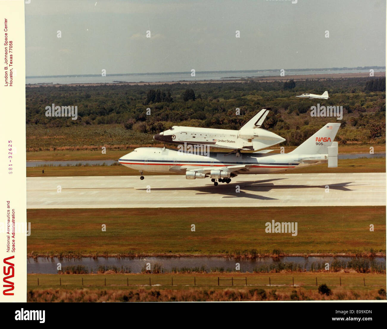 This glossy photo from NASA’s Space Shuttle Program captures the iconic ...