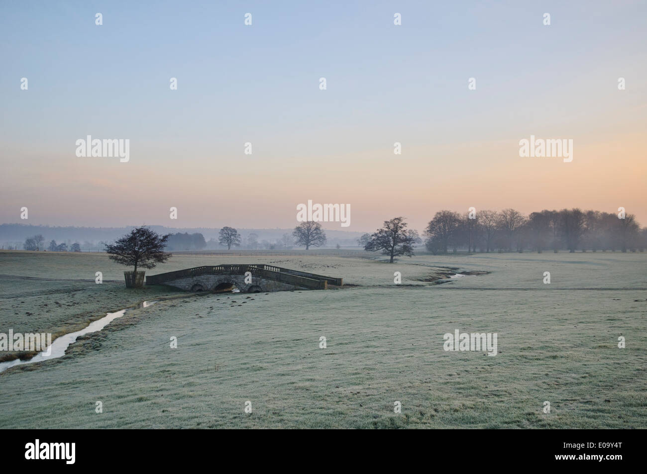 A view of the arched bridge over the beck that runs through Hovingham ...
