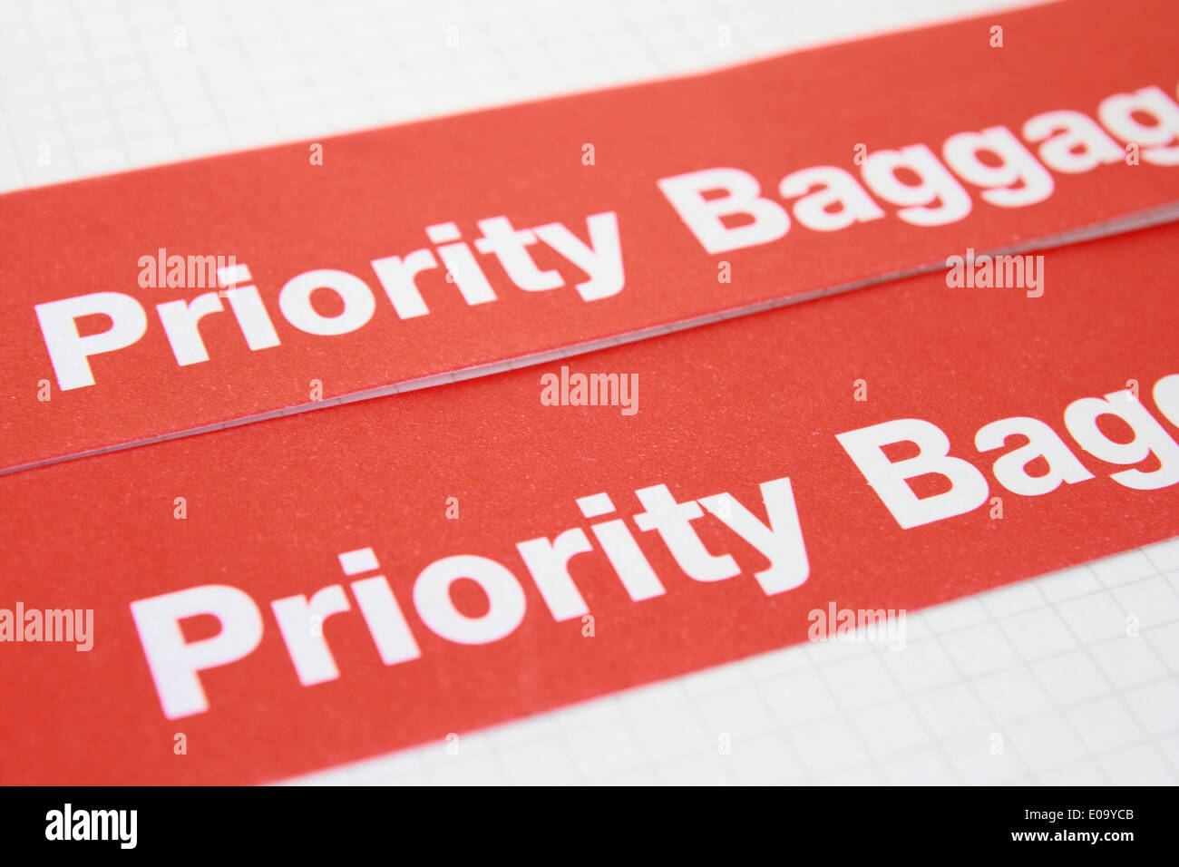 red label priority for baggage Stock Photo - Alamy