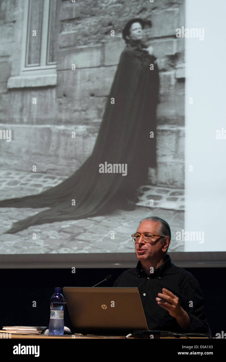 Italian photographer Guido Harari in front of his Tom Waits photo ...