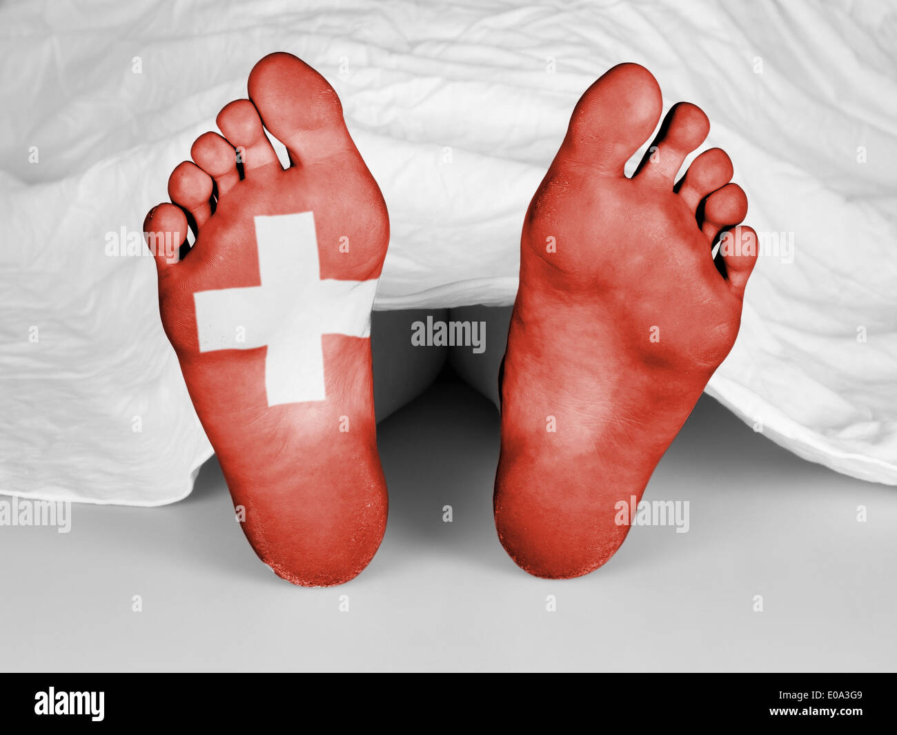 Dead body under a white sheet flag of Switzerland Stock Photo - Alamy