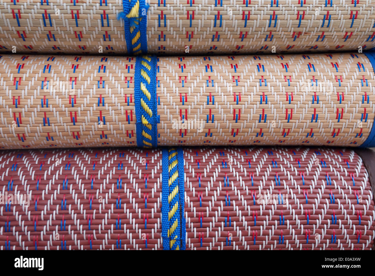 Rolls of Thai style mats Stock Photo - Alamy