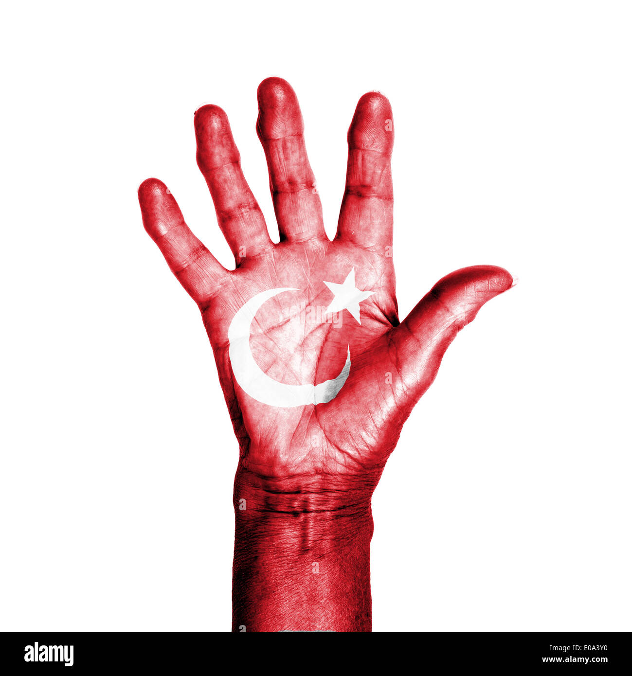 Hand of an old woman wrapped with a pattern of the flag of Turkey ...