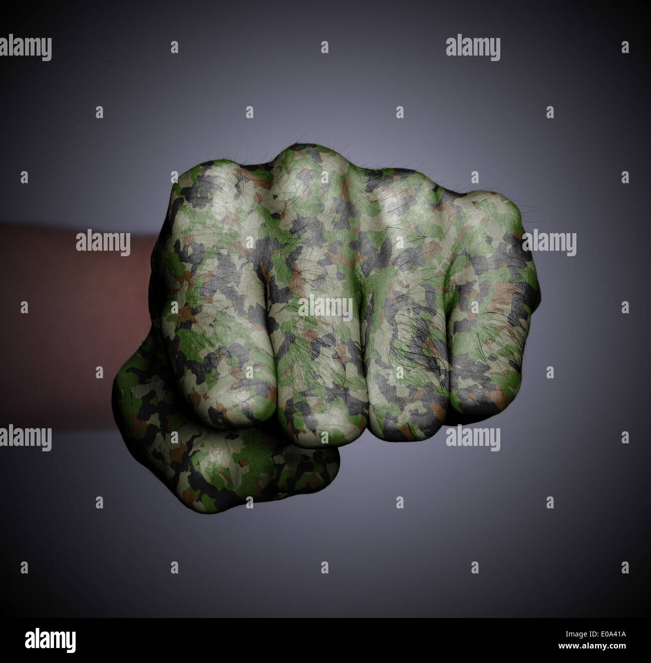 Front view of punching fist on gray background camouflage Stock Photo ...