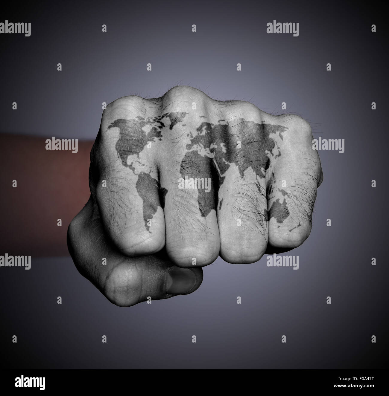 Front view of a punching hand world map Stock Photo - Alamy