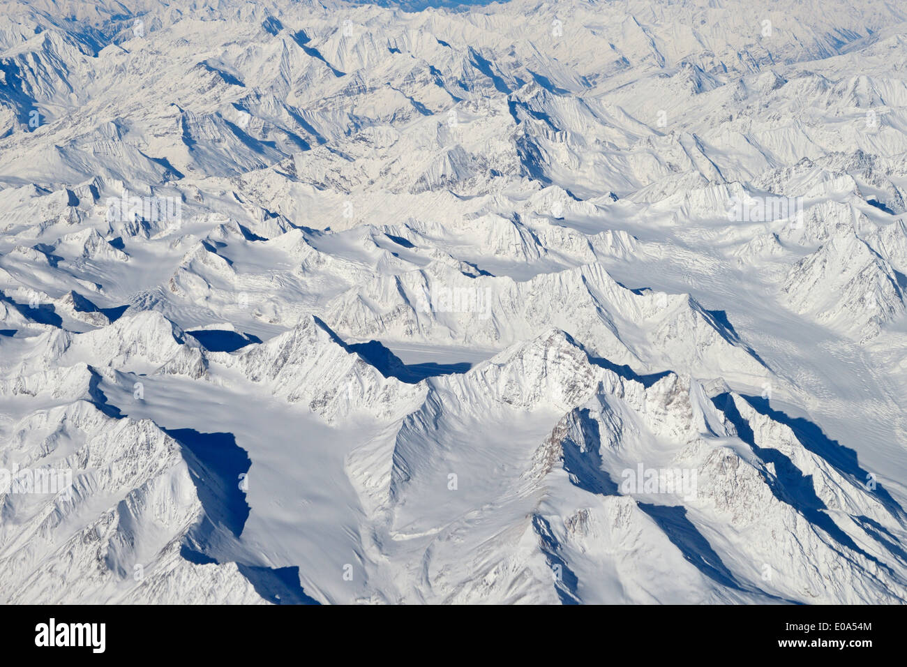 Snow covered Himalayas from the air Stock Photo - Alamy
