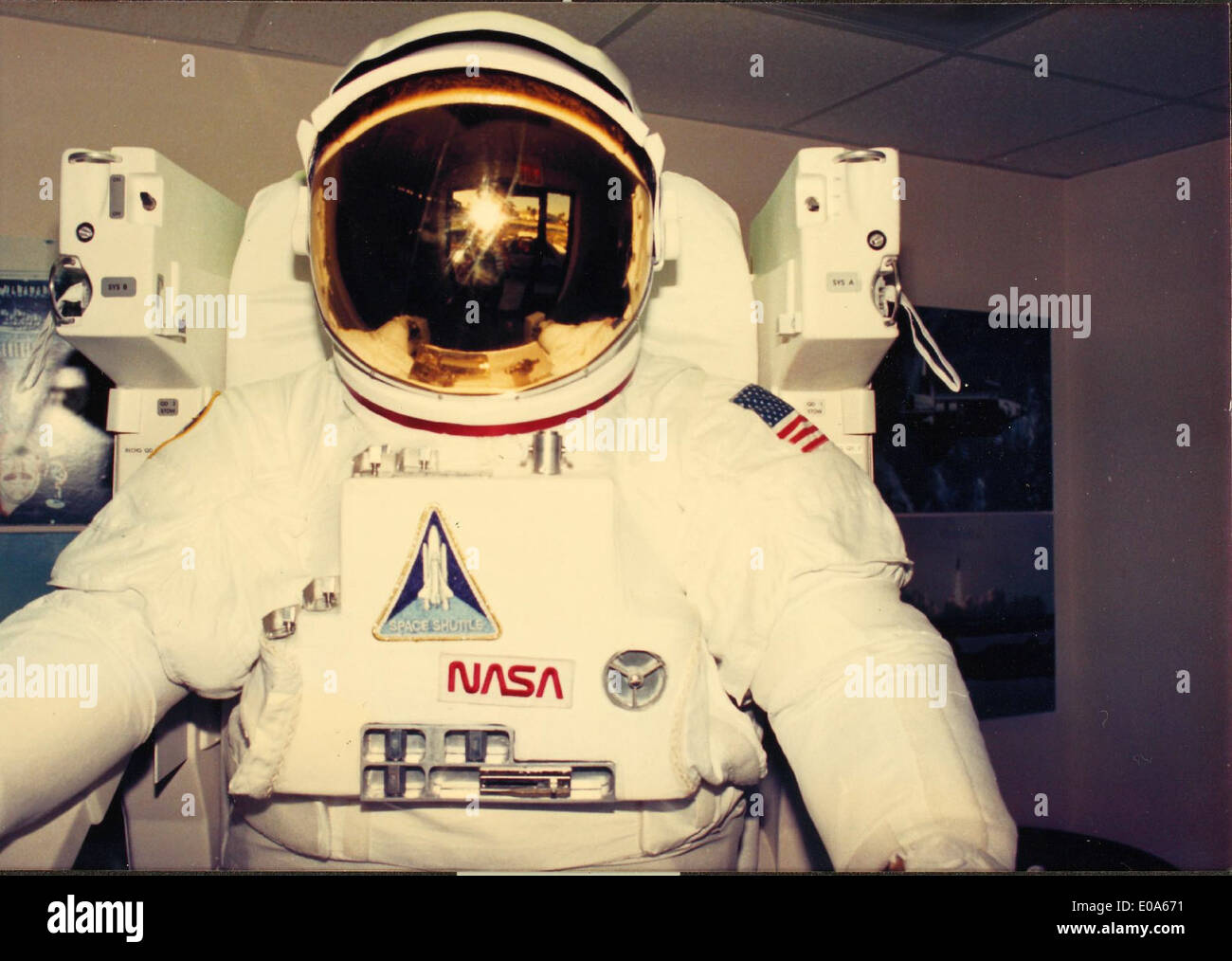 This glossy photo showcases a NASA space suit, designed for astronauts ...