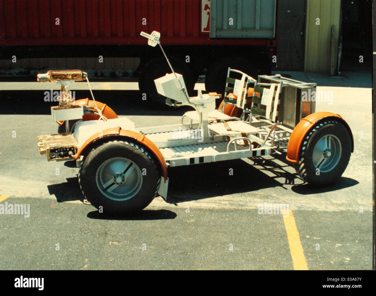 This glossy photo showcases a replica of the Lunar Rover, developed by ...