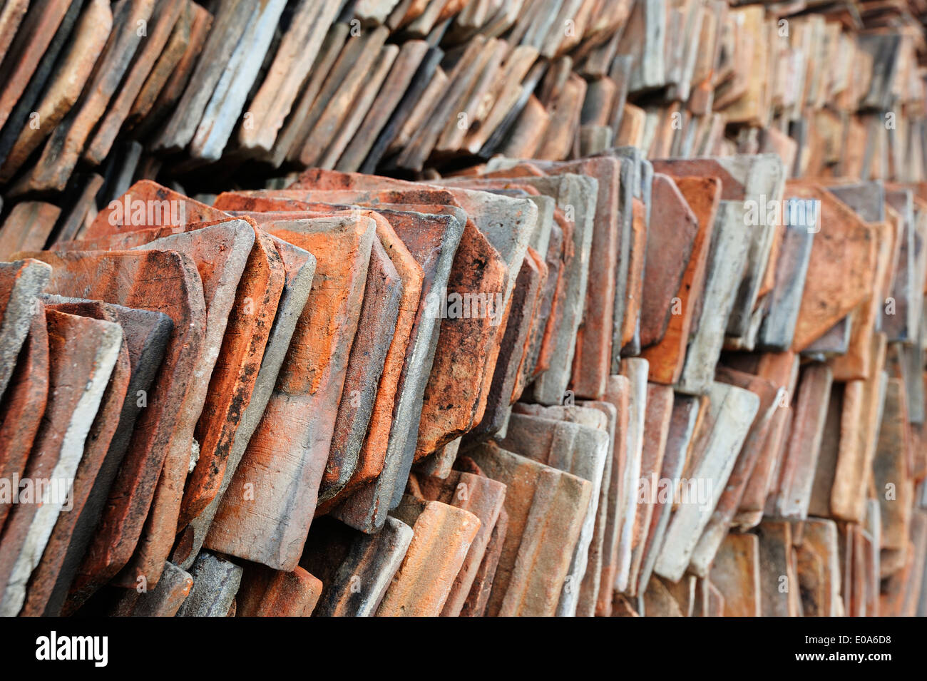 Red Clay Roof tiles all Stacked up Stock Photo - Alamy