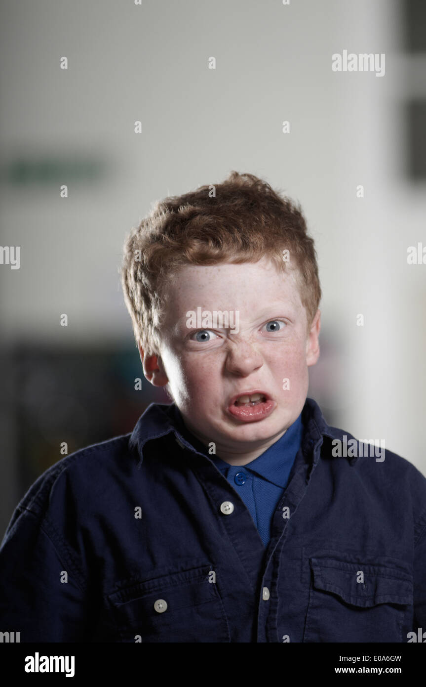 Portrait of angry boy Stock Photo - Alamy