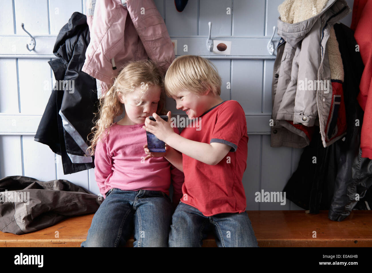 Children using cellular phone Stock Photo - Alamy