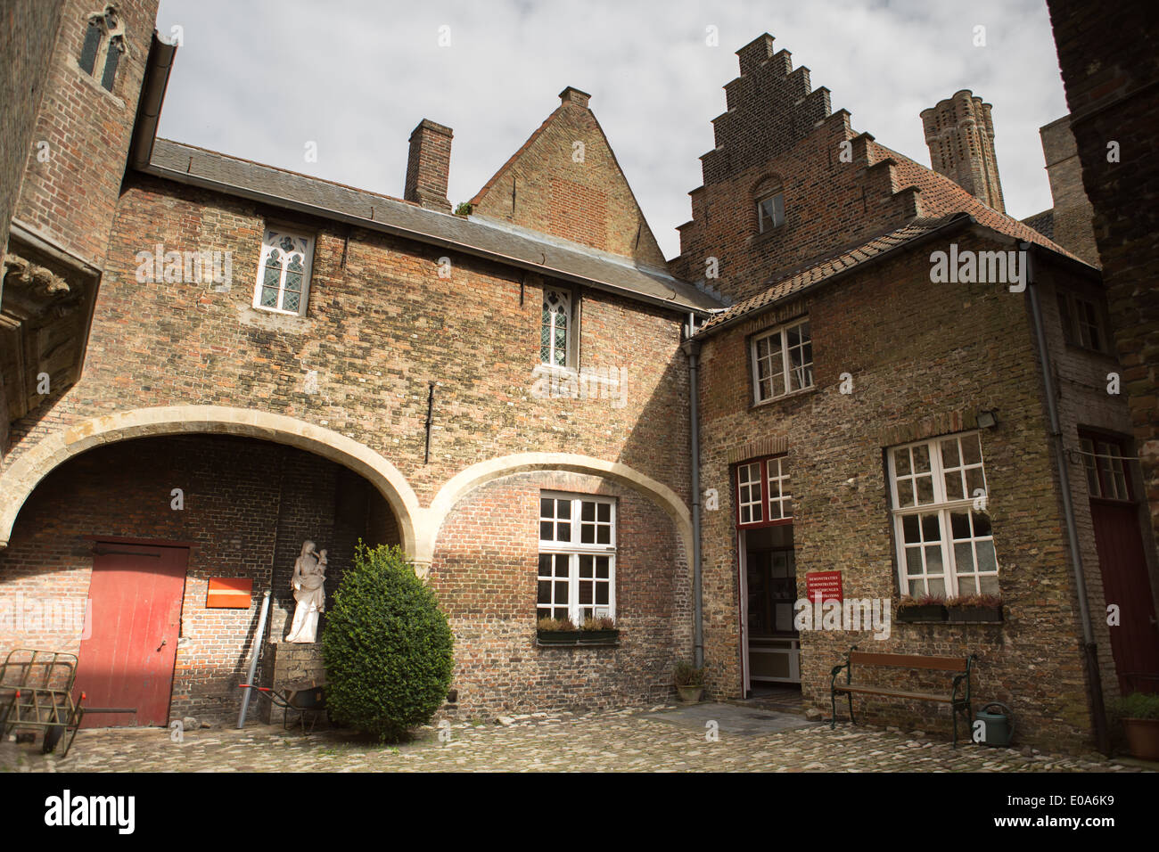 Exterior courtyard of the Kantcentrum (lace museum) and Jeruzalemkerk ...
