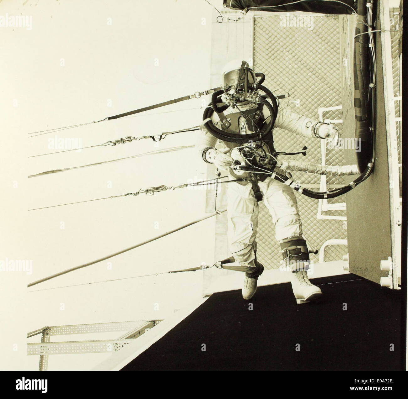 This glossy photograph displays NASA space suits, essential for ...