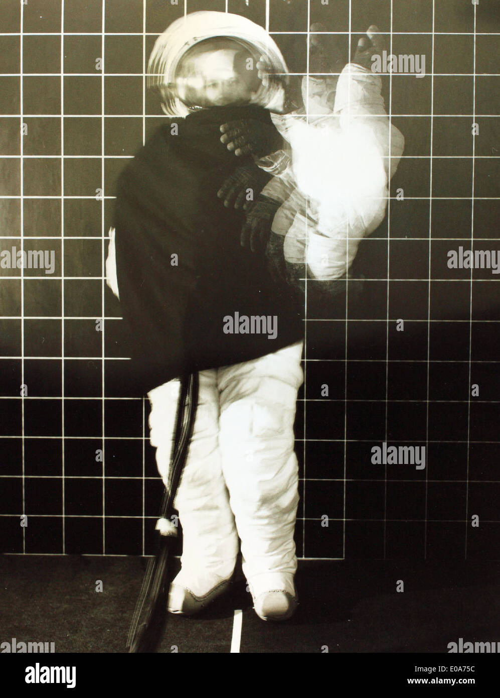 This glossy photo showcases NASA's space suits, essential for astronaut ...
