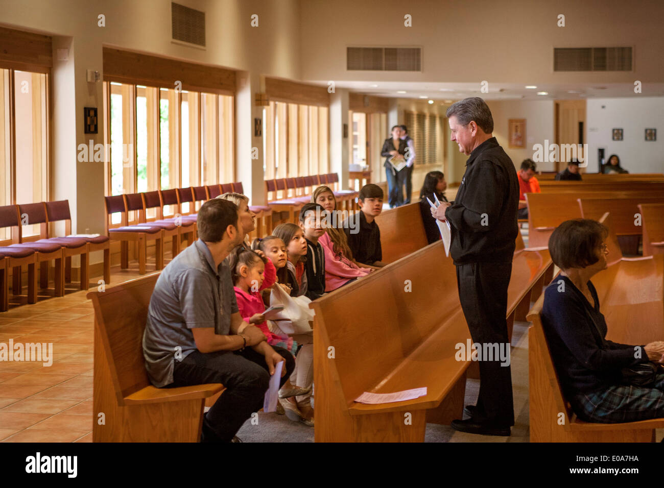 Priest greeting parishioners hi-res stock photography and images - Alamy