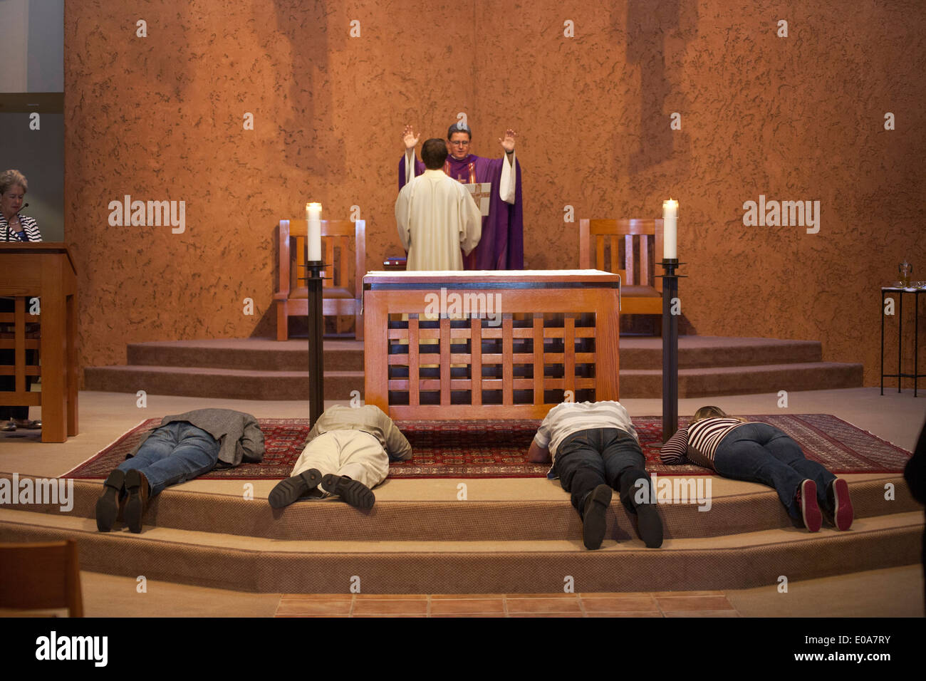 Catechumens, or people wishing to become Catholics, prostrate Stock ...