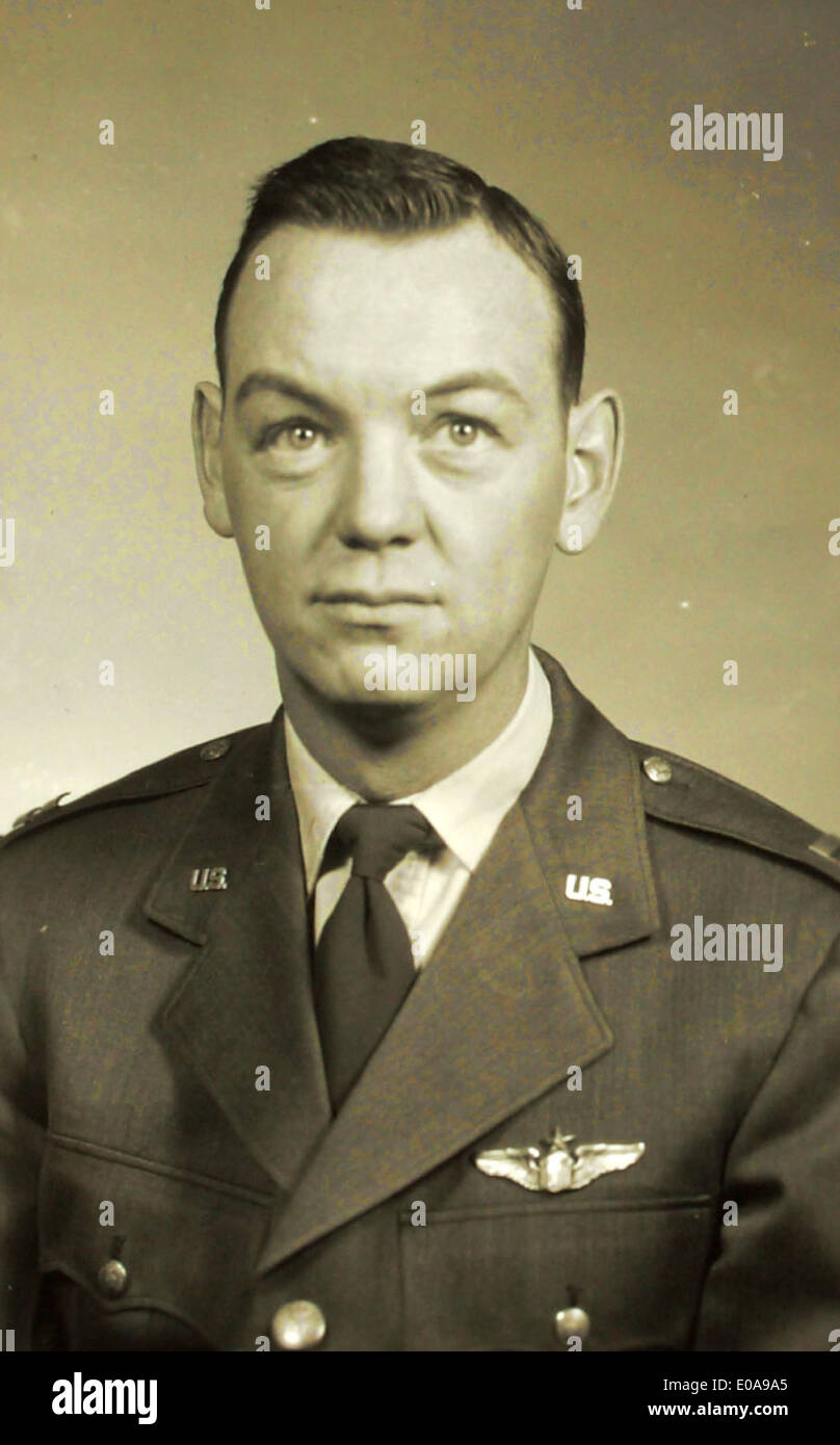 This glossy photo features NASA personnel, showcasing the key figures ...