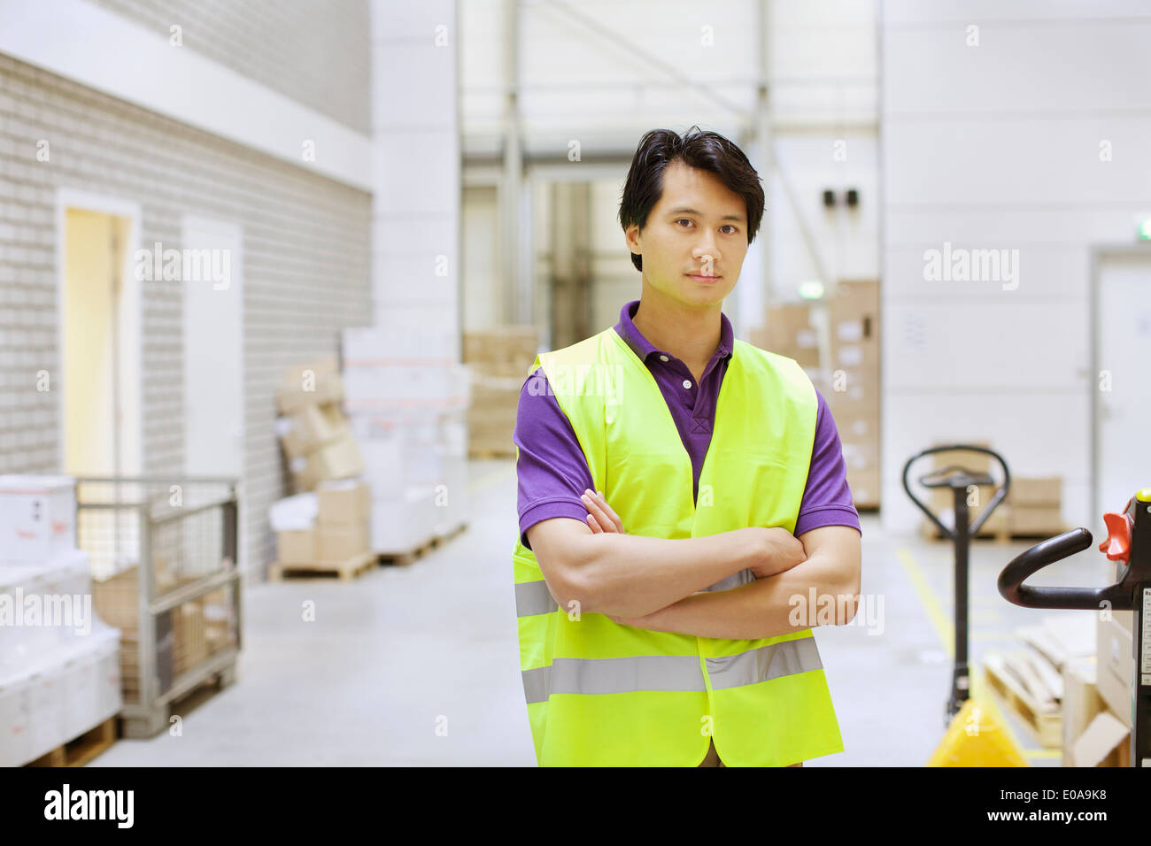 Portrait of male warehouse worker in distribution warehouse Stock Photo ...