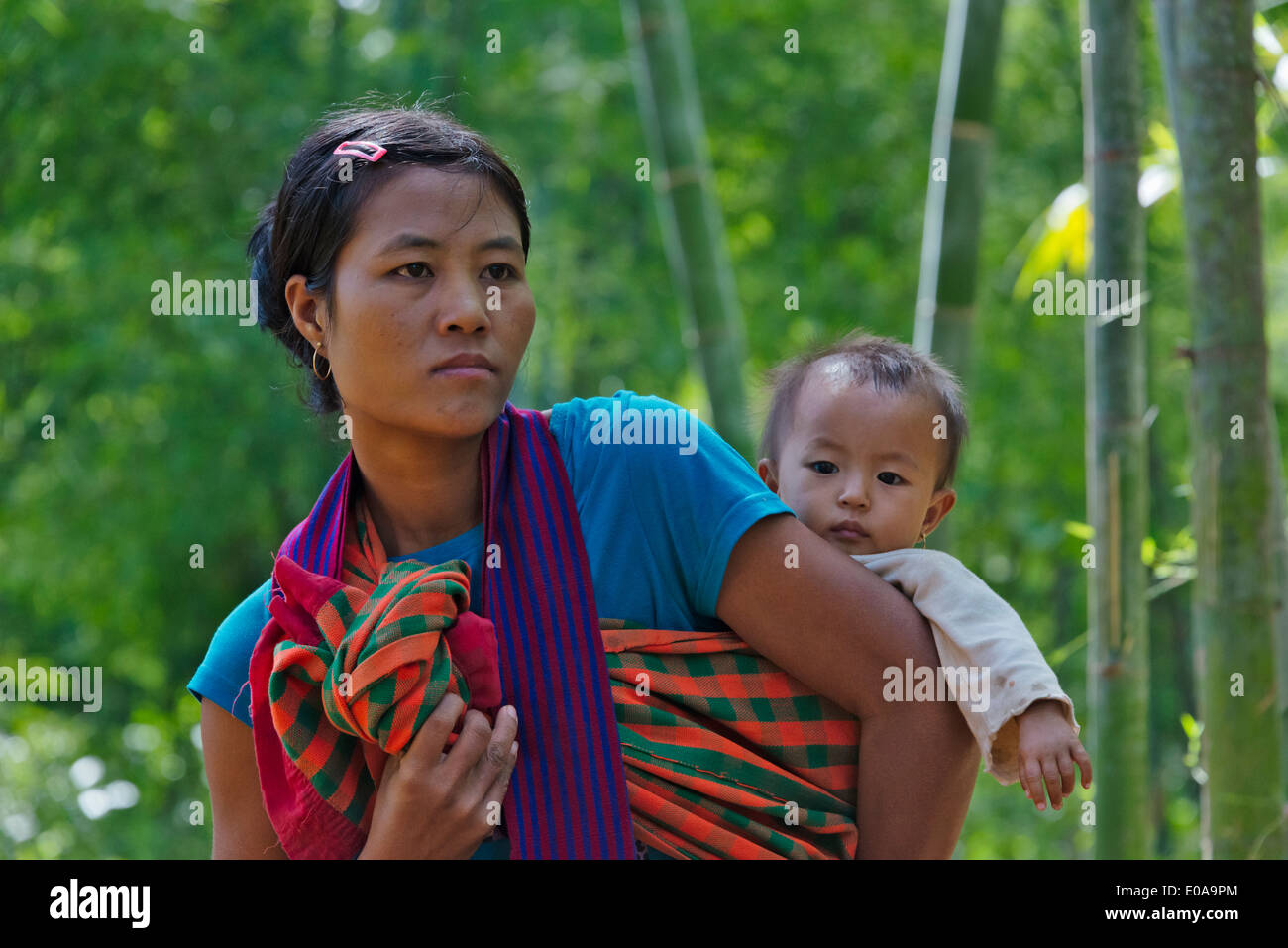 Pa-O woman carrying baby on the back, Inle Lake, Shan State, Myanmar ...
