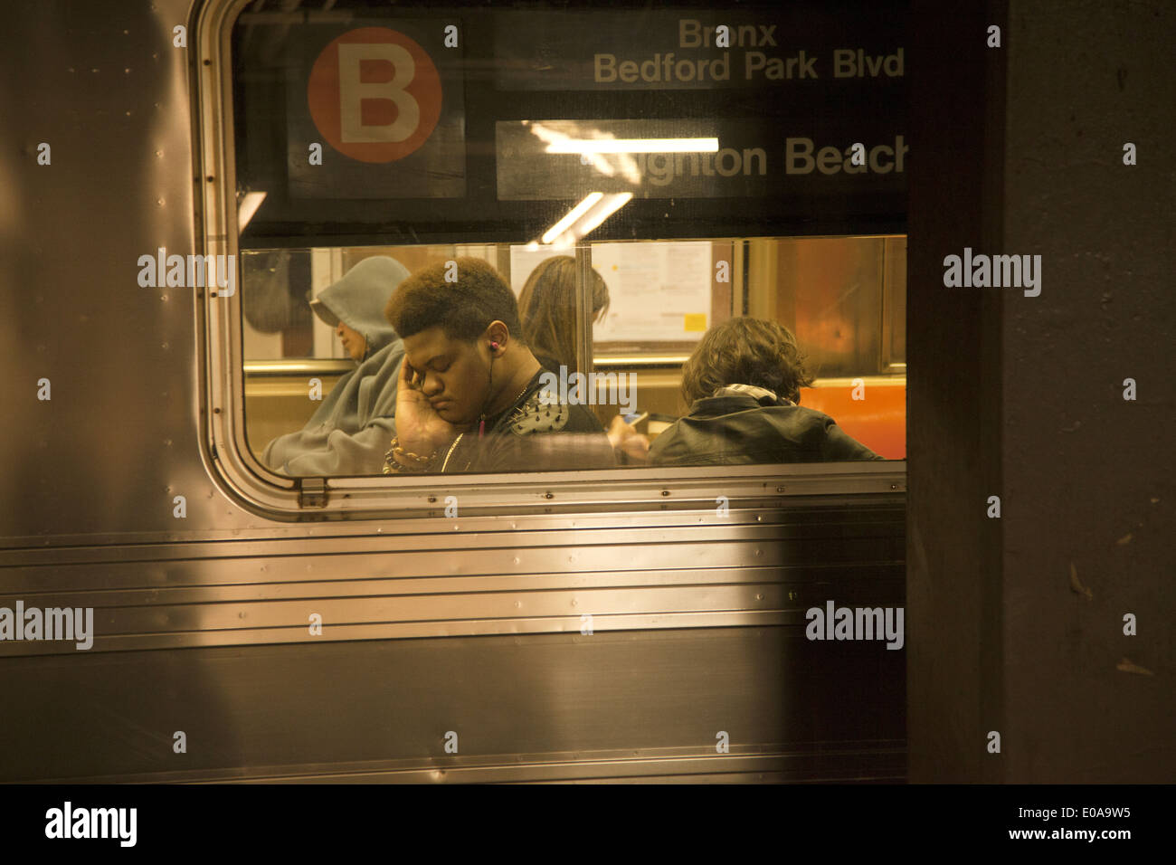 Sleeping napping riders passengers hi-res stock photography and images ...