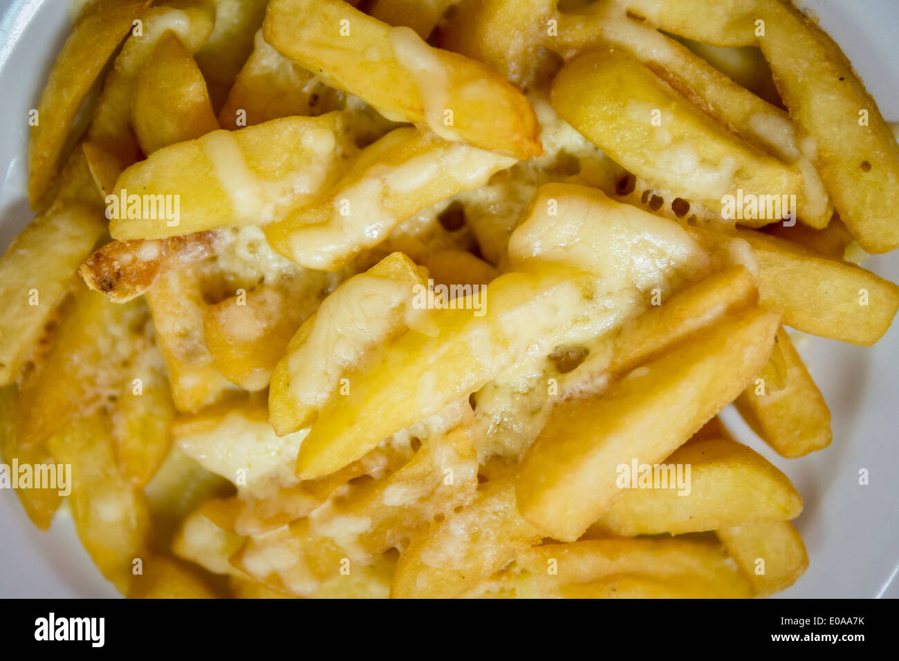 Cheesy Chips or Cheese fries Stock Photo - Alamy