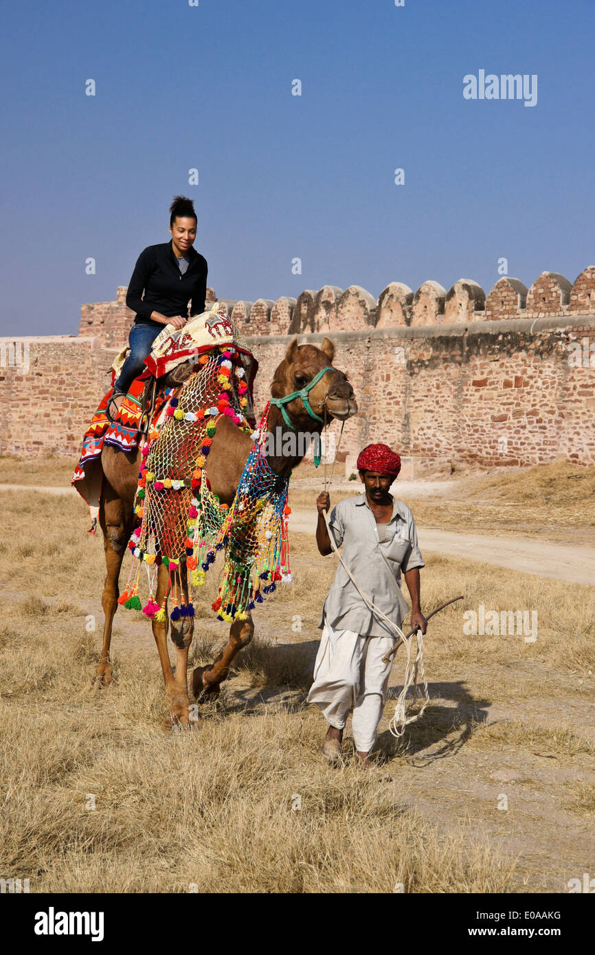 Woman riding camel hi-res stock photography and images - Alamy
