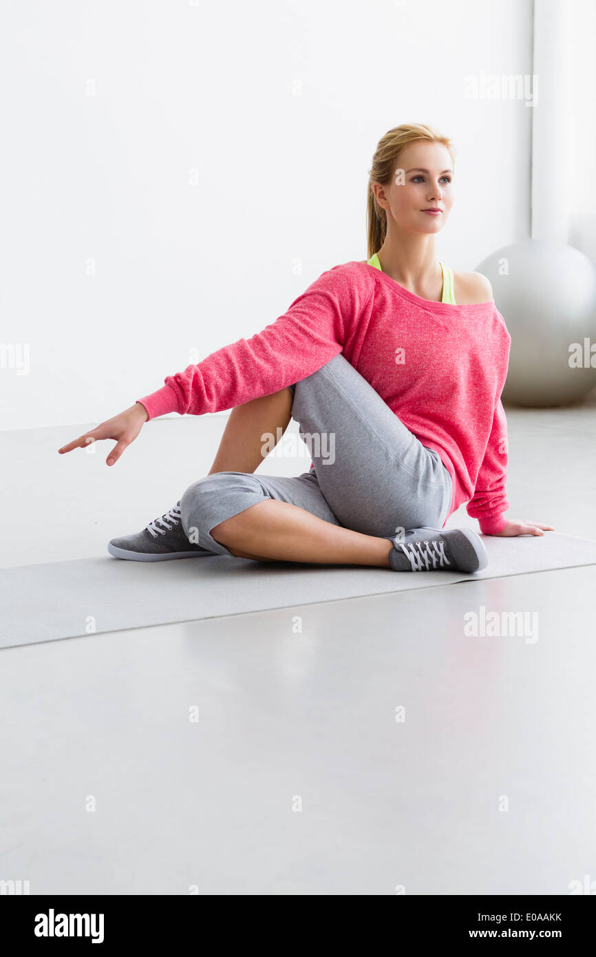 Women sitting on mat hi-res stock photography and images - Alamy