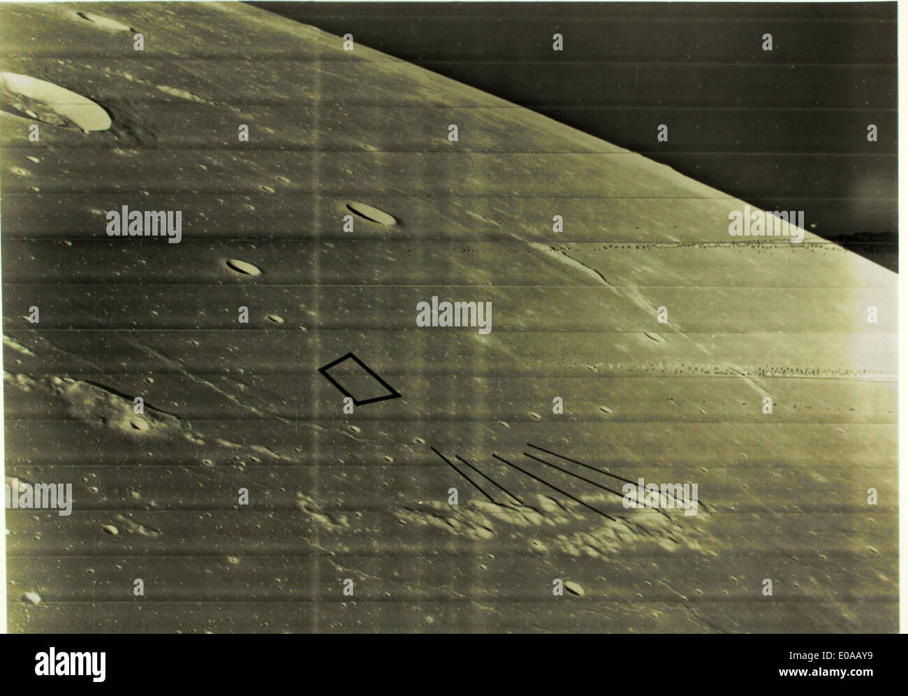 A glossy photo of the Moon, showcasing its surface details and craters ...