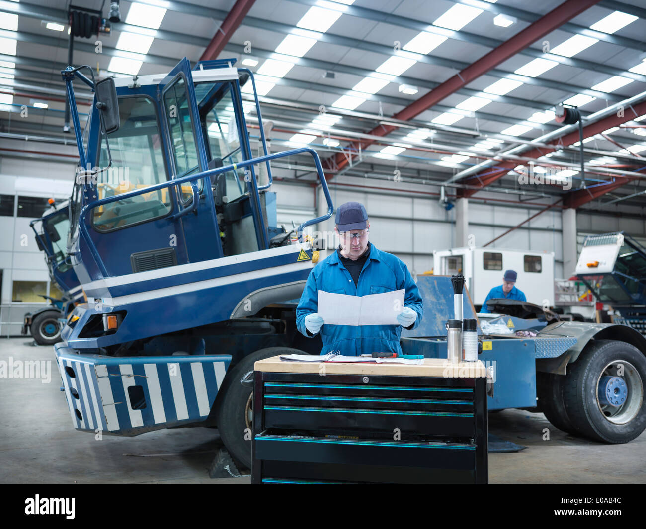 Two man working hard hi-res stock photography and images - Alamy