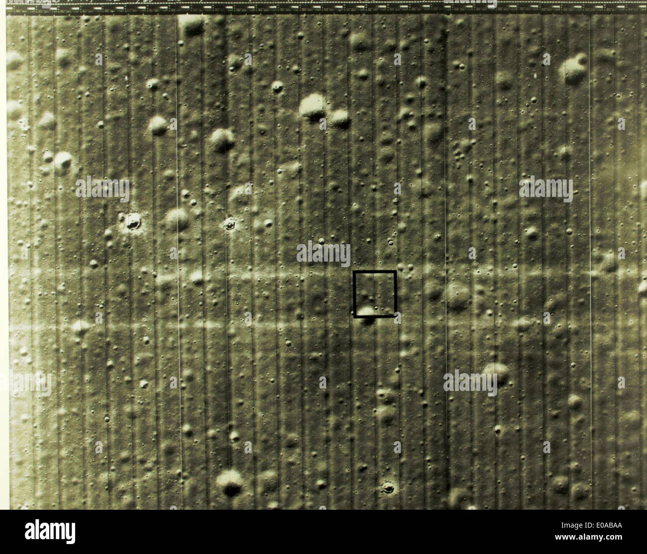 This glossy photograph from NASA features the Moon, captured during the ...