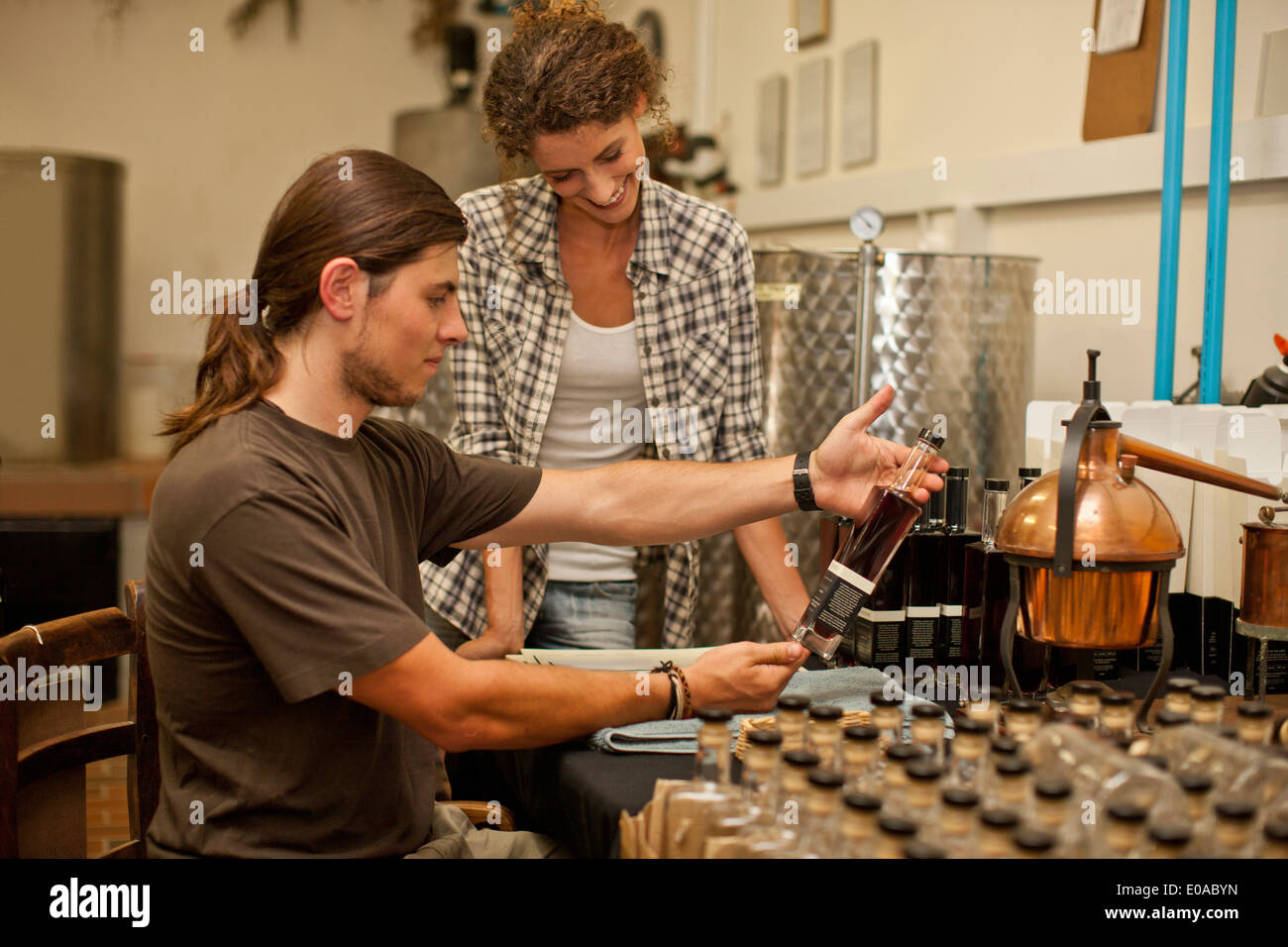 Man working distillery hi-res stock photography and images - Alamy