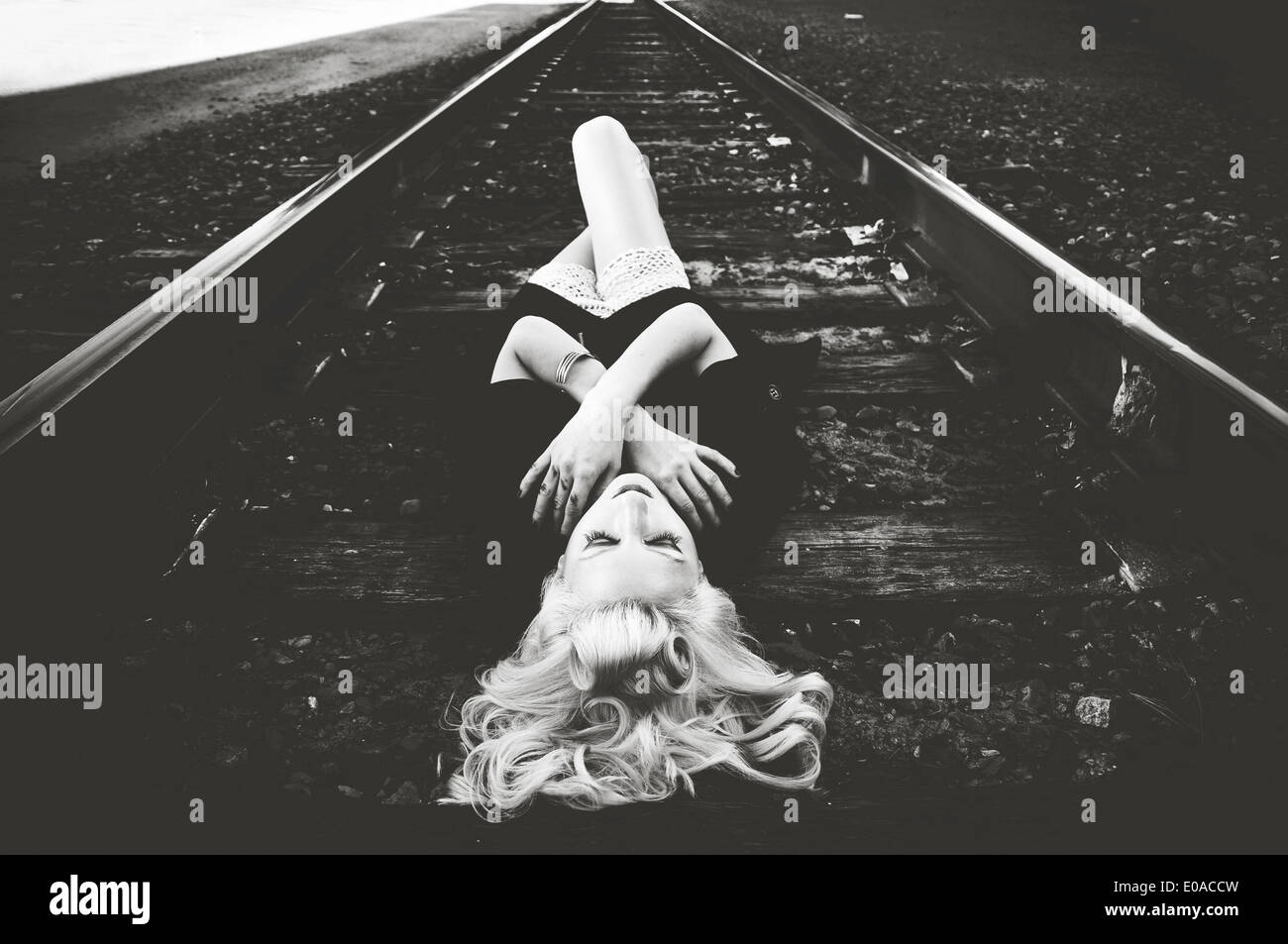 Laying on railroad tracks hi-res stock photography and images - Alamy