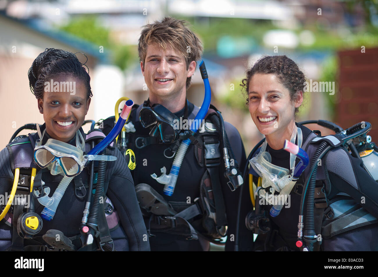 Portrait three young adult scuba divers Stock Photo - Alamy