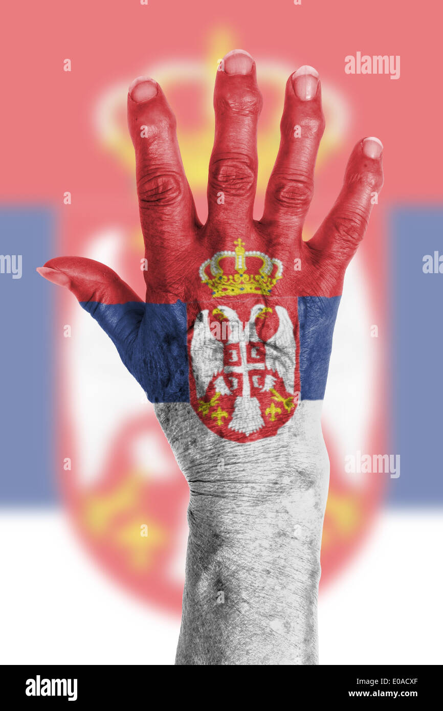 Serbia flag hand on hi-res stock photography and images - Alamy