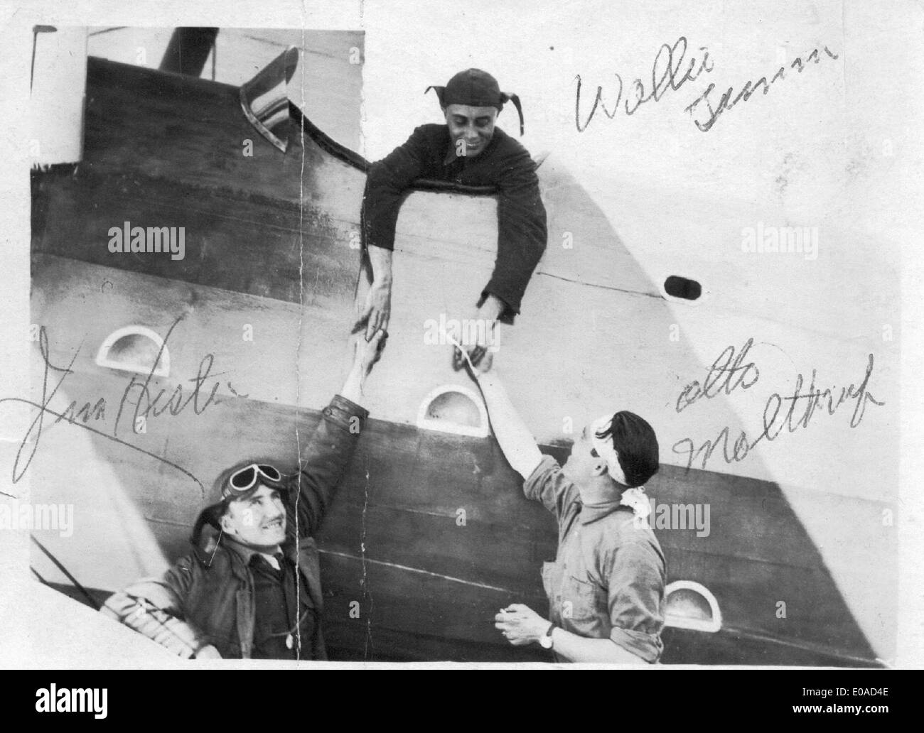 Jim Hester stands next to the Douglas Cloudster, a biplane used for air ...