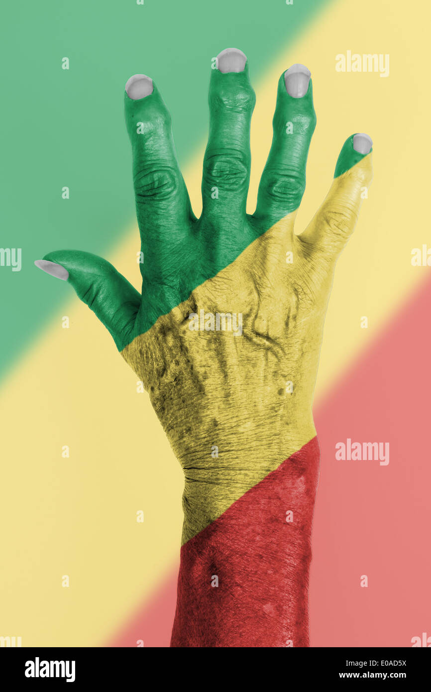 Hand of an old woman wrapped in flag of the republic of Congo Stock ...