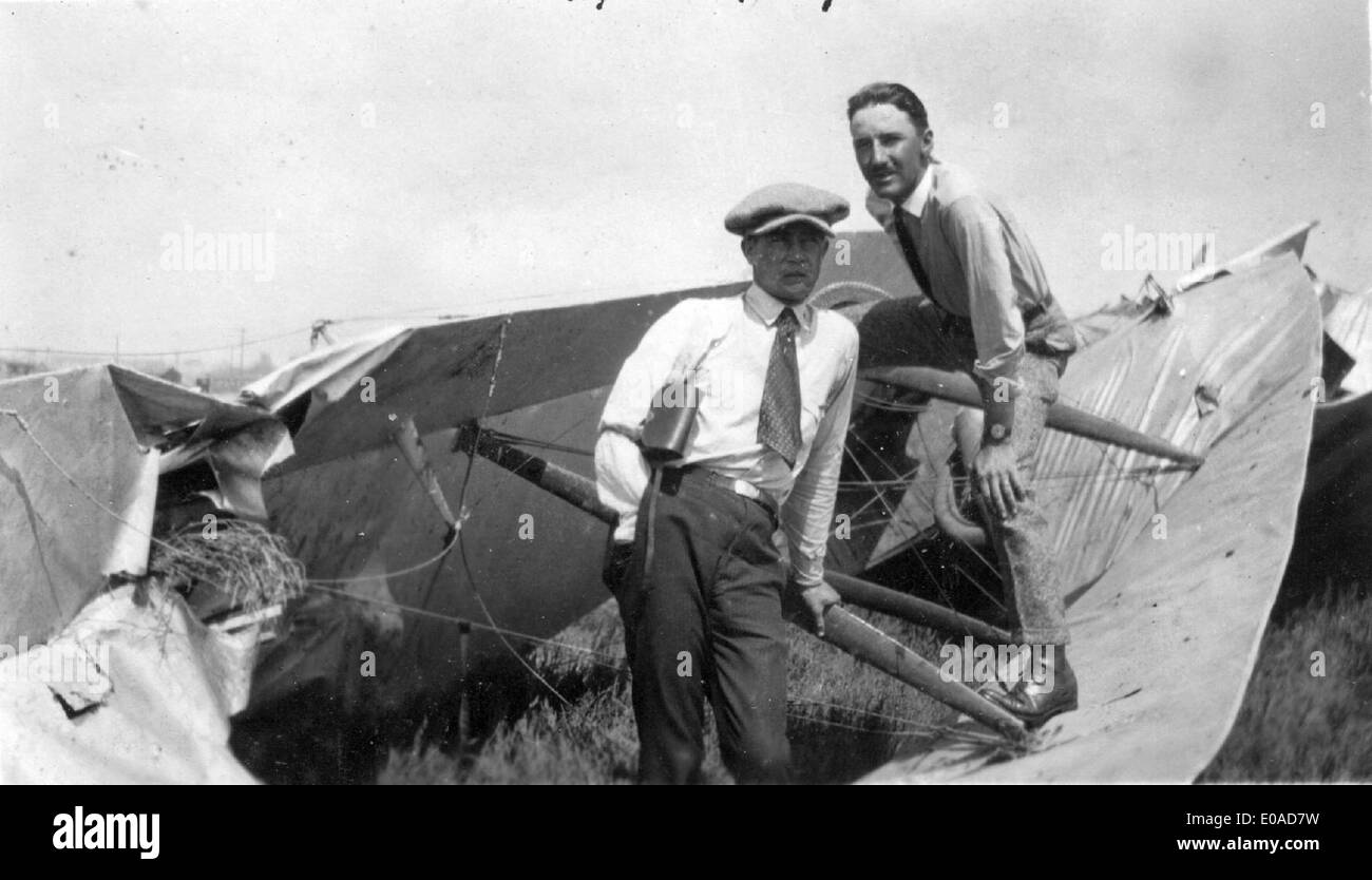 This photo captures aviators Jim Hester and Clark standing near a ...