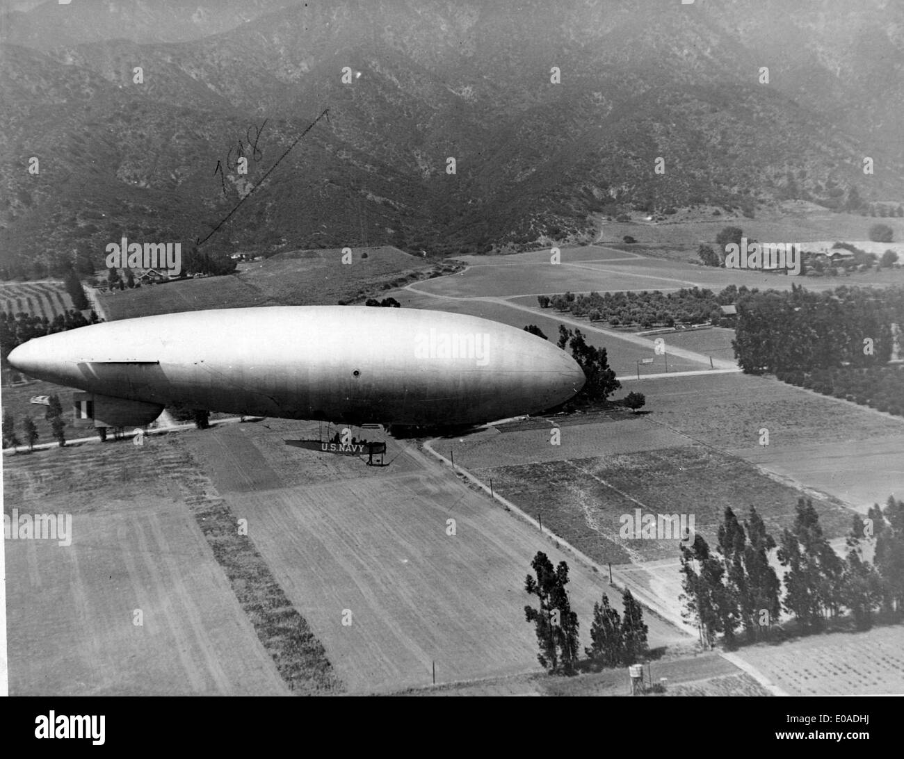 This image shows a U.S. Navy blimp flying over Beverly Hills ...